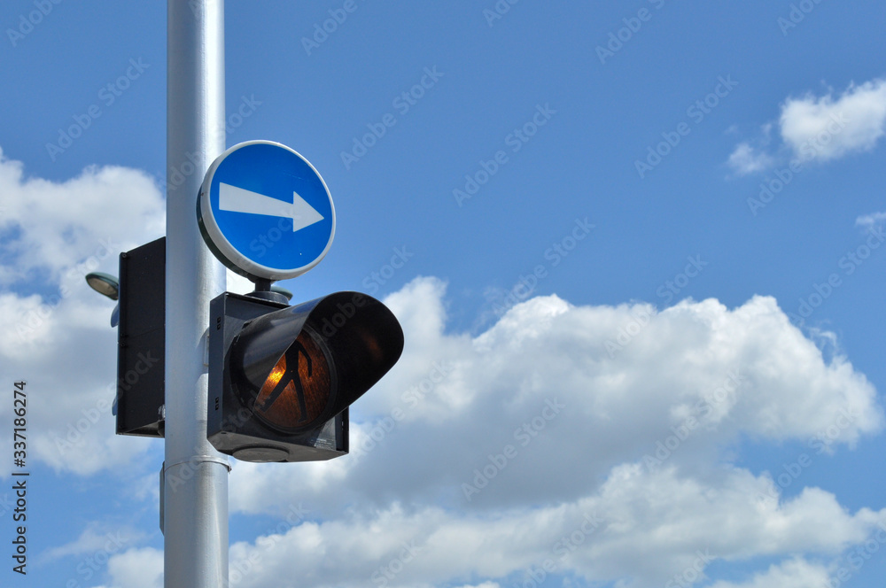 Pedestrian warning light on a pole with an arrow pointing right Stock ...