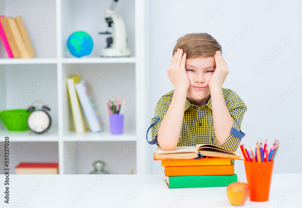 Back to school. Tired little child boy sleeping while doing homework ...