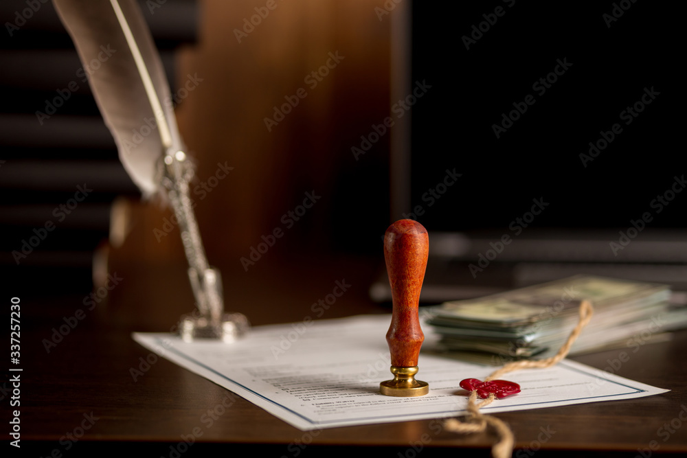 Notary's public pen and stamp on testament and last will. Notary public ...