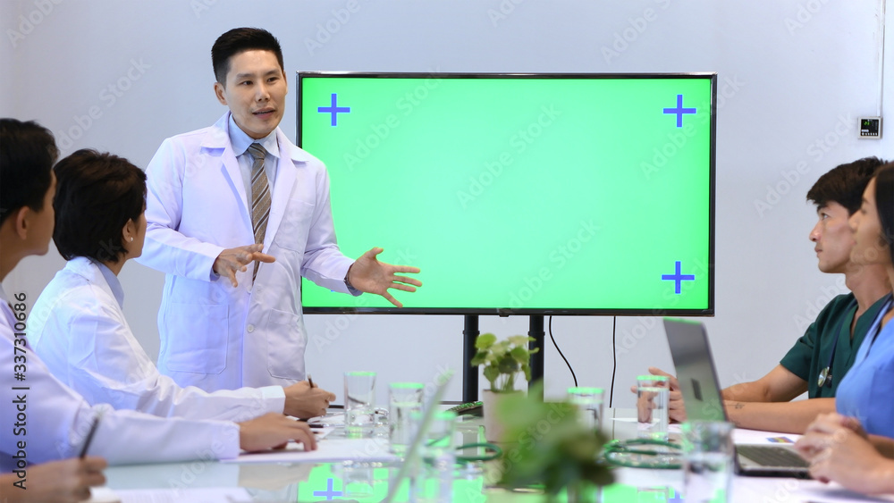 Medical concept. The doctor is explaining the meeting by previewing on ...