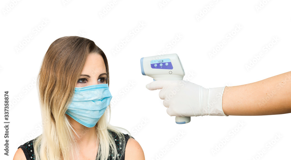 measurement of woman's temperature by infrared non-contact thermometer ...