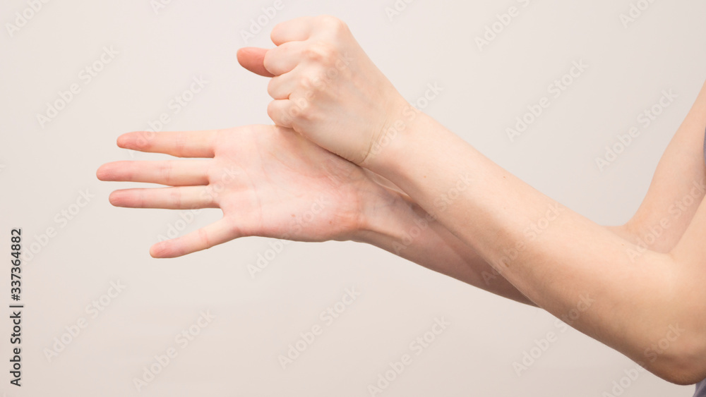 Parkinson's disease symptoms. Close up of tremor (shaking) hands of ...