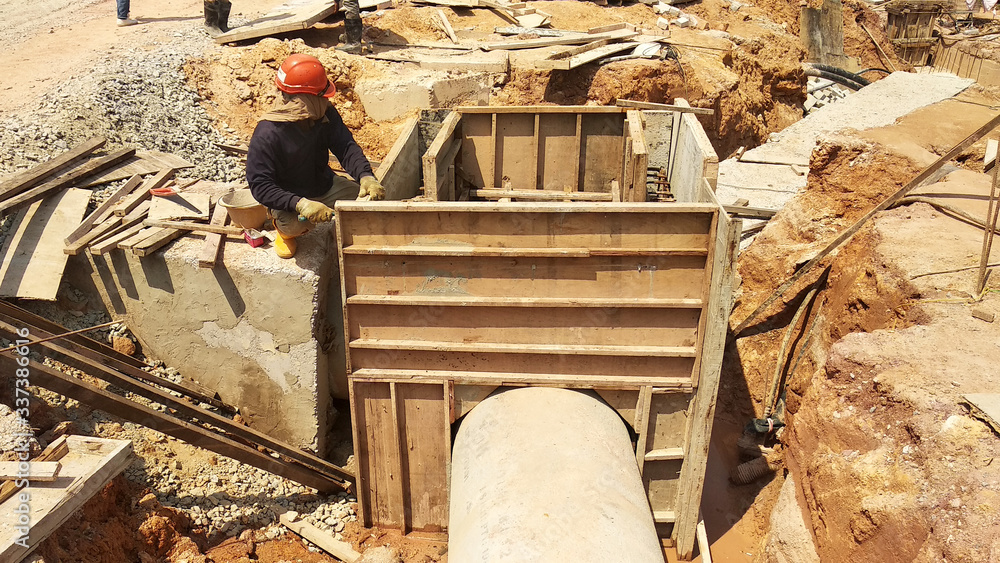 SEREMBAN, MALAYSIA -MARCH 11, 2020: Utility services manhole under ...