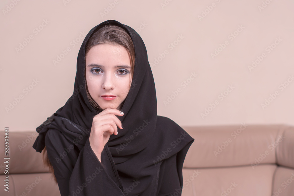 Arabic girl wearing abaya.Arab young girl dressed in black abaya ...