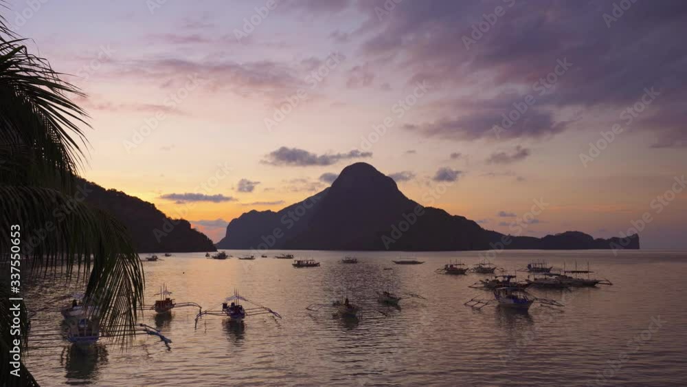 El Nido, Palawan island, Philippines. Silhouette of trip boats in ...