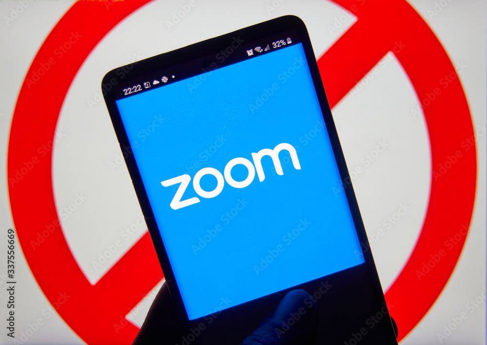 Zoom app and logo on screen over prohibited ban sign. Zoom software ...