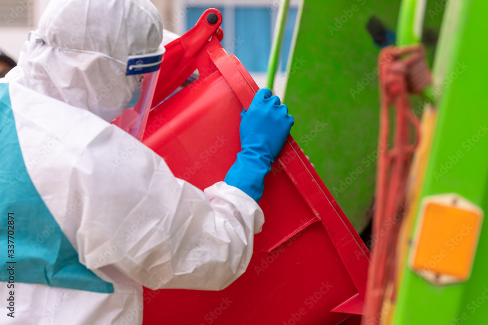 worker wear PPE protective clothing against corona virus of Infectious ...