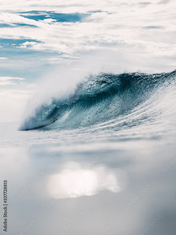 Perfect barrel wave in ocean. Breaking wave with sun light Stock Photo ...