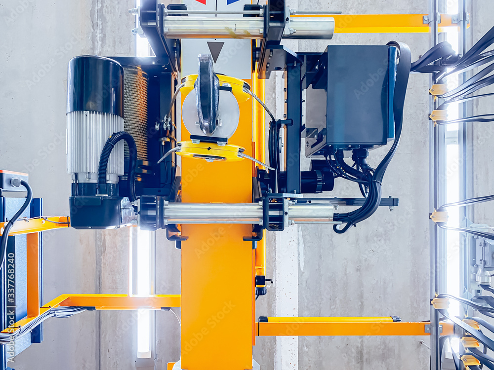 Overhead crane and machine inside factory building, industrial ...