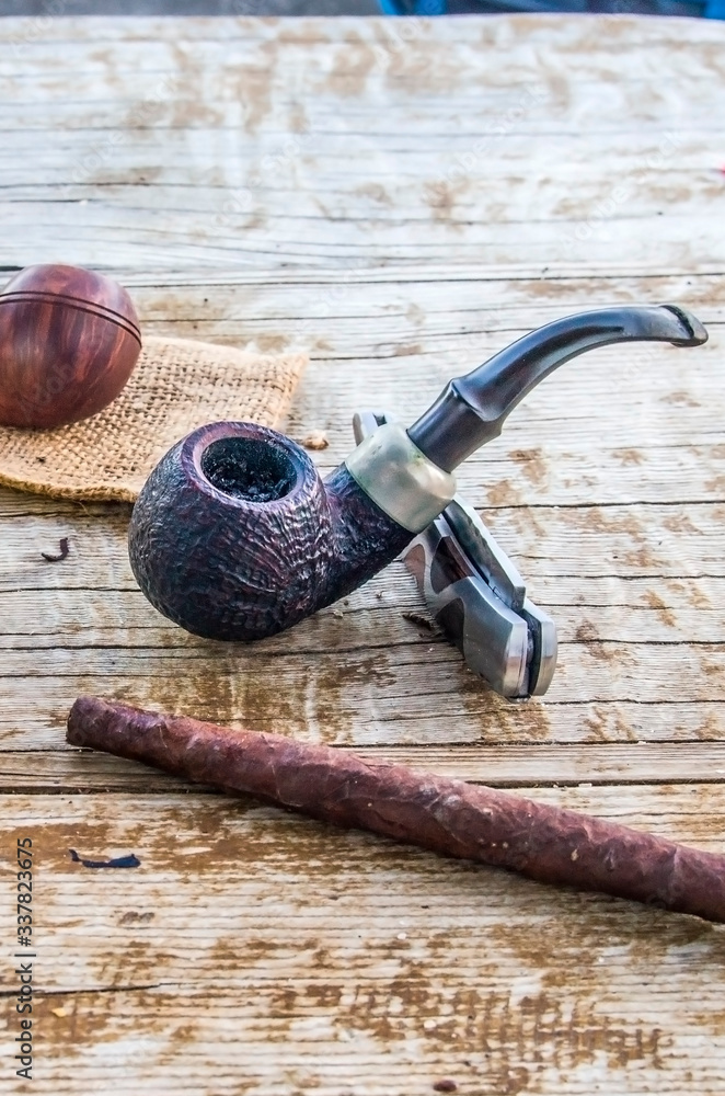 tools for the pleasure of slow smoking, pipe, cigar, tobacco. Stock ...