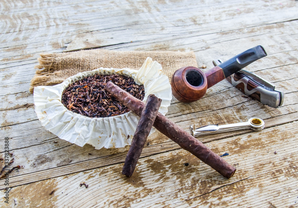 tools for the pleasure of slow smoking, pipe, cigar, tobacco. Stock ...