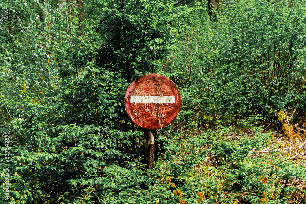 No entry sign in the forest. Stock Photo | Adobe Stock