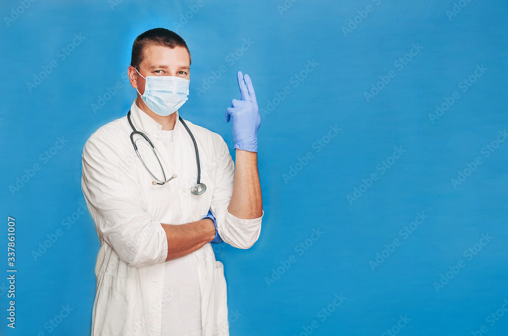 Fotografia do Stock: Doctor proctologist on a blue background in a ...
