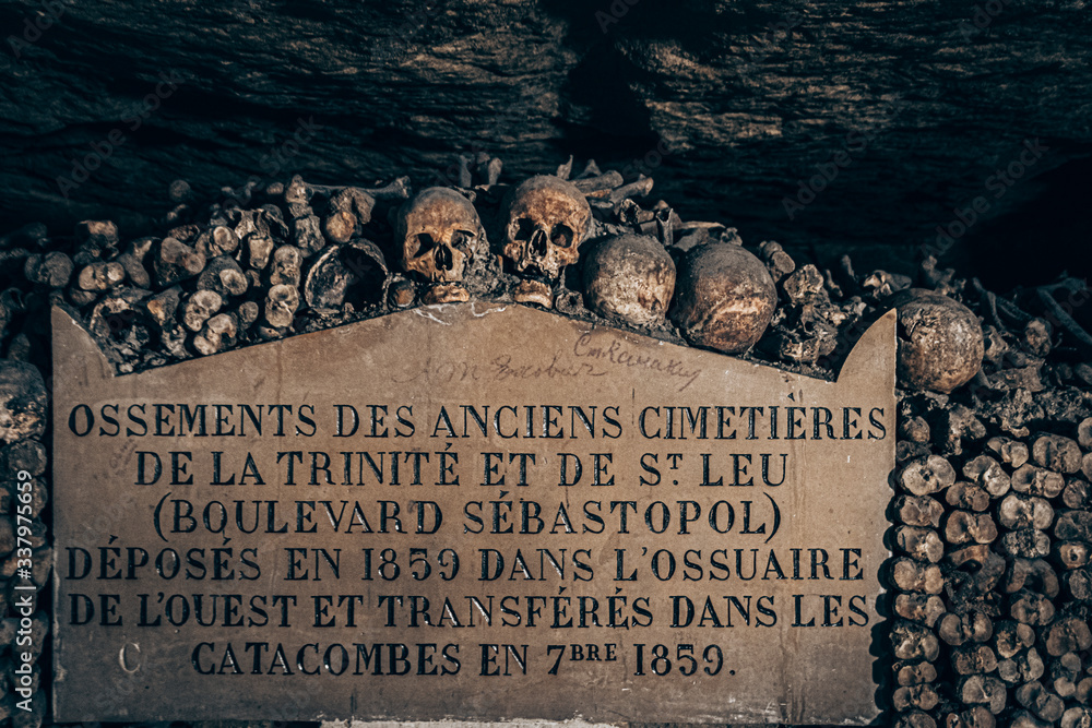 underground catacombs full of bones, gravestones and inscriptions Stock ...