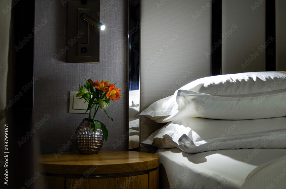 Nightly turndown service inside bedroom with king or queen double bed ...