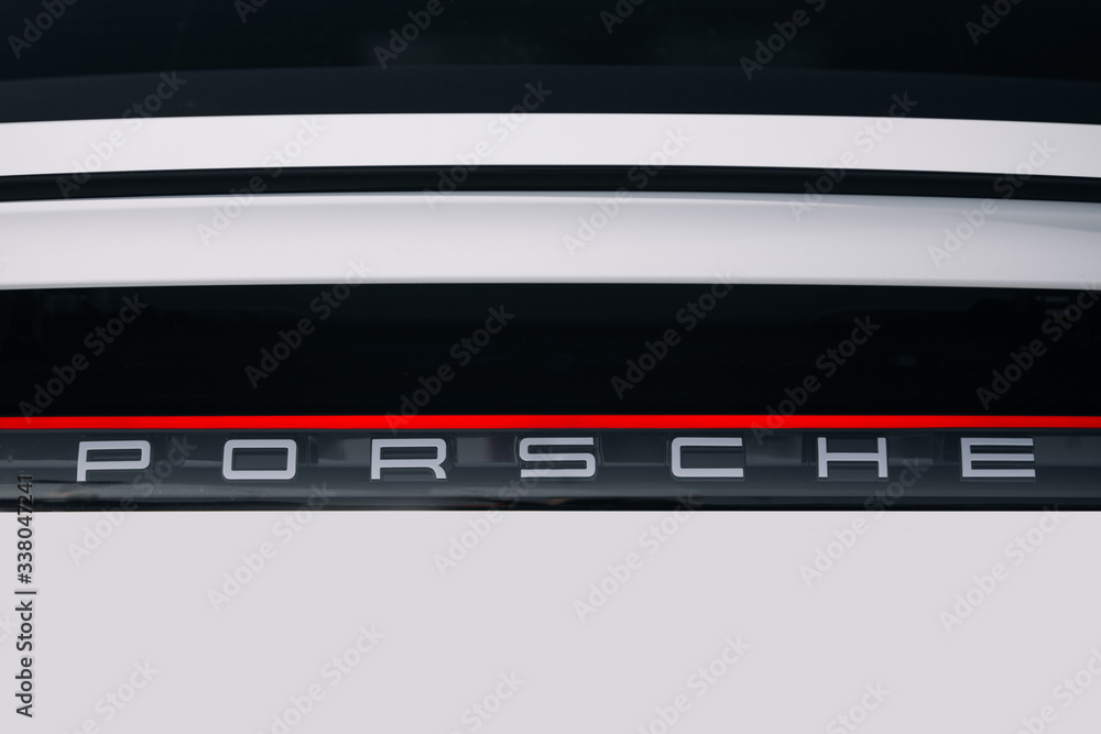 Porsche logo at the trunk with backlight Stock Photo | Adobe Stock
