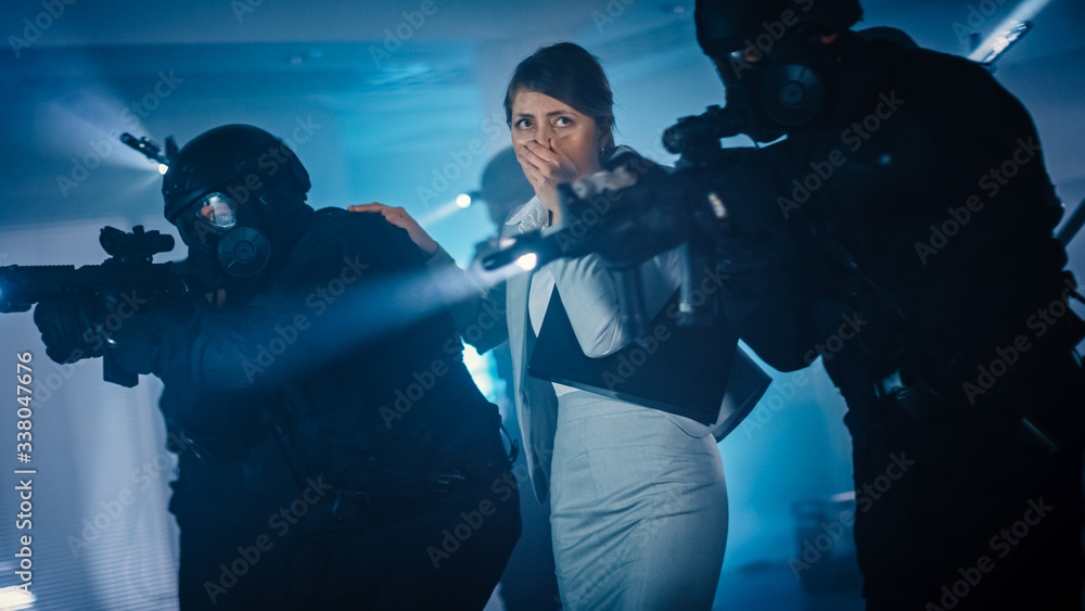 Masked Squad of Armed SWAT Police Officers Rescue a Female Hostage in a ...