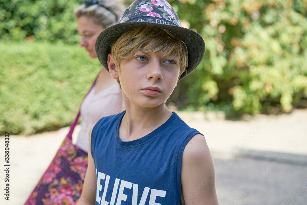 Boy misunderstood by his mother looking unhappy and sad Stock Photo ...