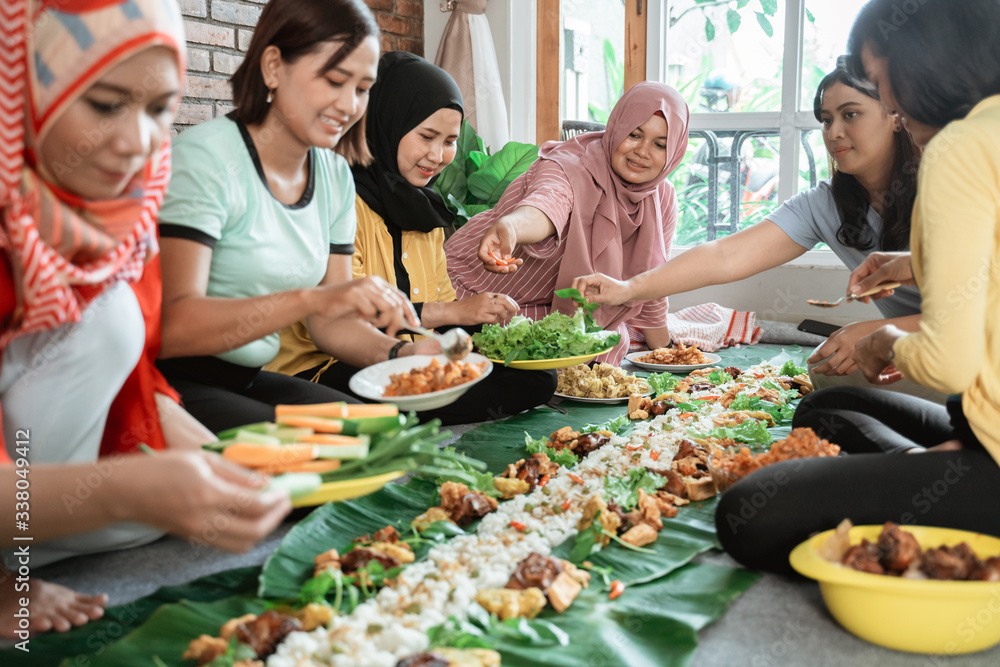 muslim asian woman social gathering at home having lunch together ...