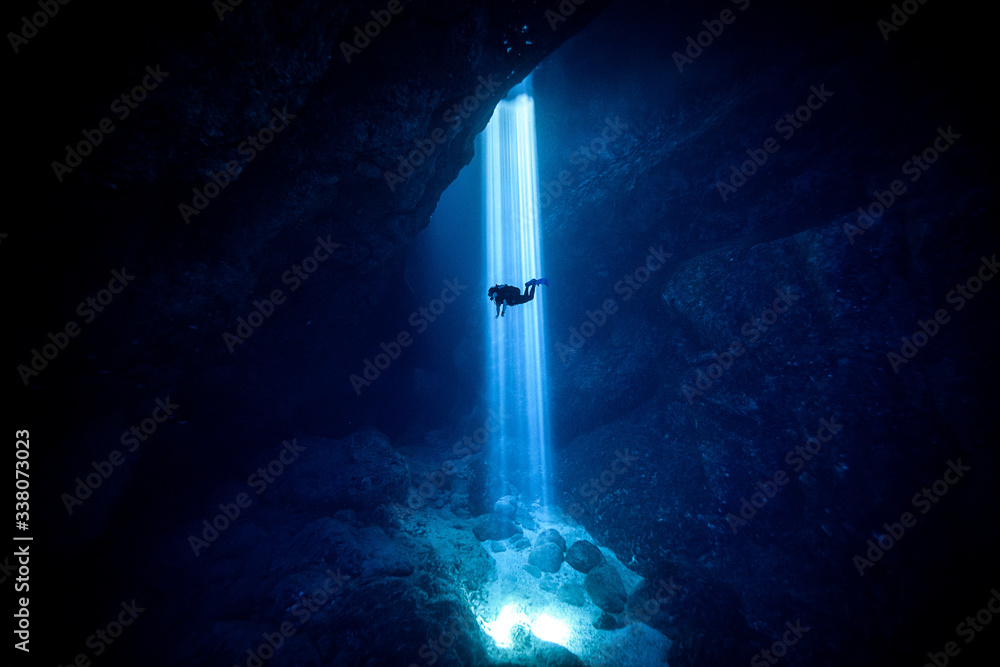 Sunlight Falling On Silhouette Person Scuba Diving Undersea Stock Photo ...