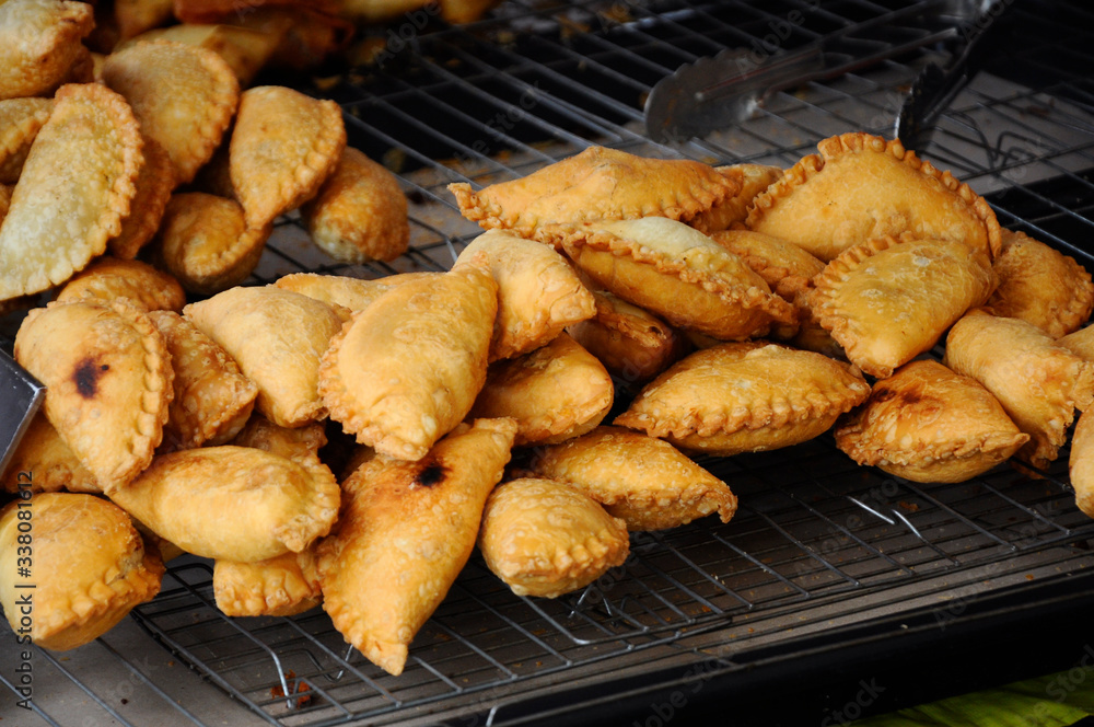 Curry puffs for sale. It is one of the traditional cakes in Malaysia ...