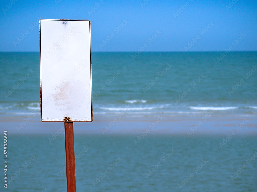 Blank sign for swimmers at the beach. With space for place your text ...