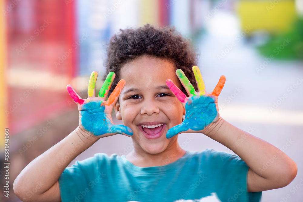 beautiful happy boy with painted hands Stock Photo | Adobe Stock