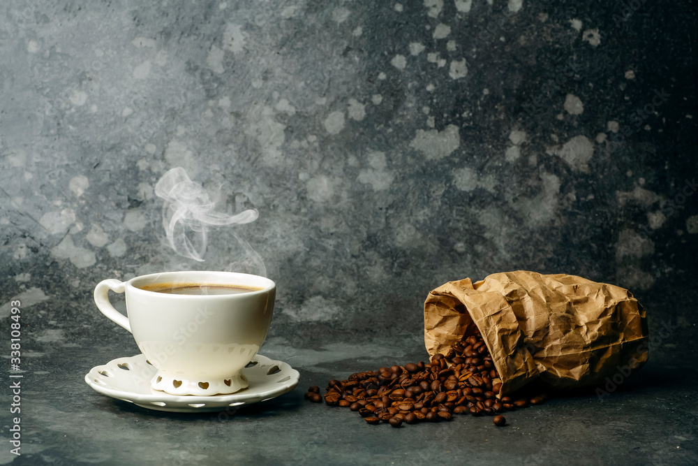 Coffee background. Coffee beans and cup on dark backgrpund. Coffee ...