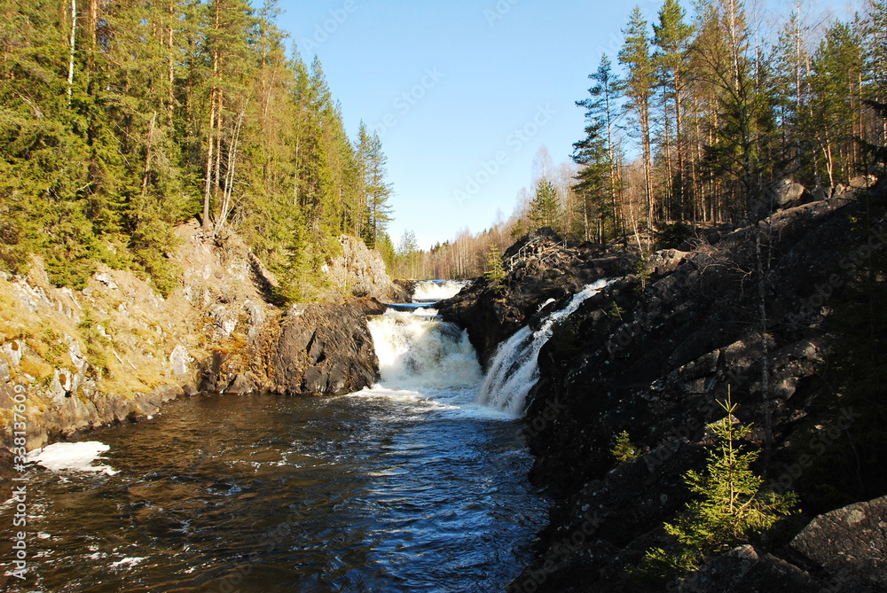 Kivach Falls is high cascade waterfall in Russia. It is located on Suna ...