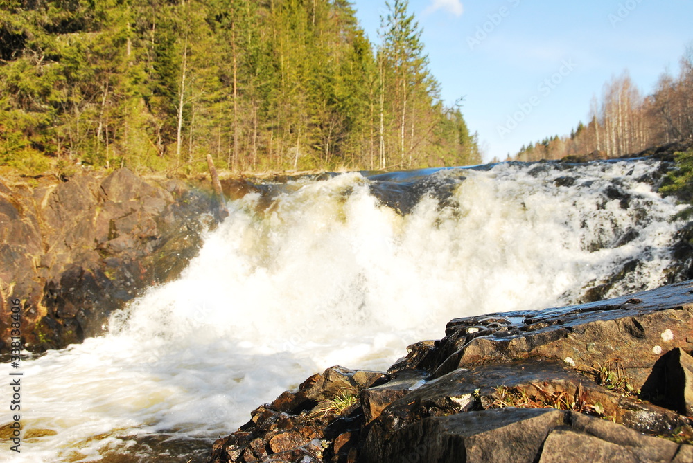 Kivach Falls is high cascade waterfall in Russia. It is located on Suna ...