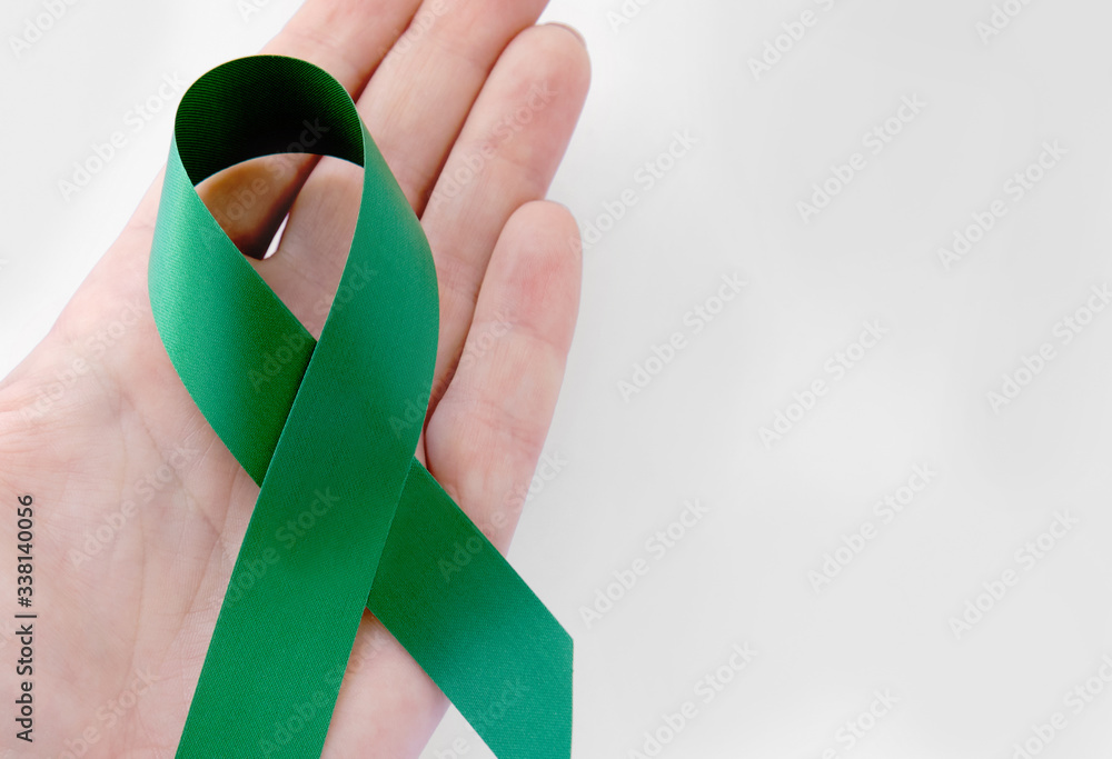 Green symbolic ribbon - the problem of organ donation, kidney cancer ...