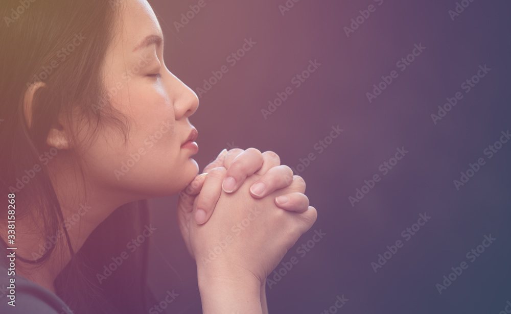 woman praying and worship to GOD Using hands to pray in religious beliefs and worship christian ...