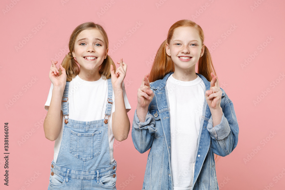 Smiling little kids girls 12-13 years old in denim clothes isolated on ...