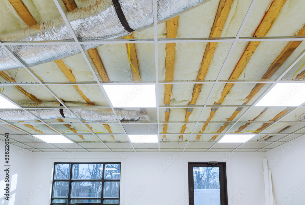 Office room frame hung ceiling at construction of metal rails of a ...