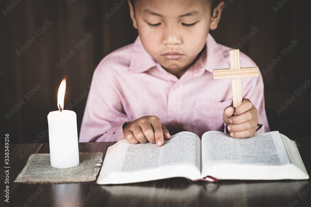 Child praying for christian religion,The boy who intended on the cross ...