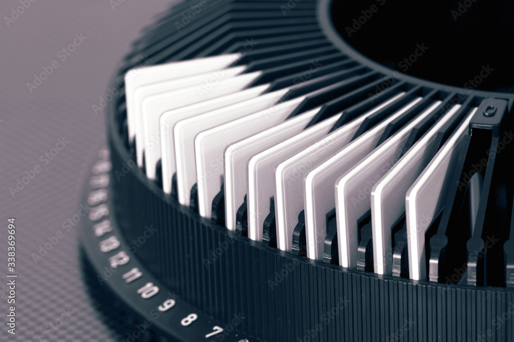 Old photo slides in a carousel magazine tray. On a carbon background ...