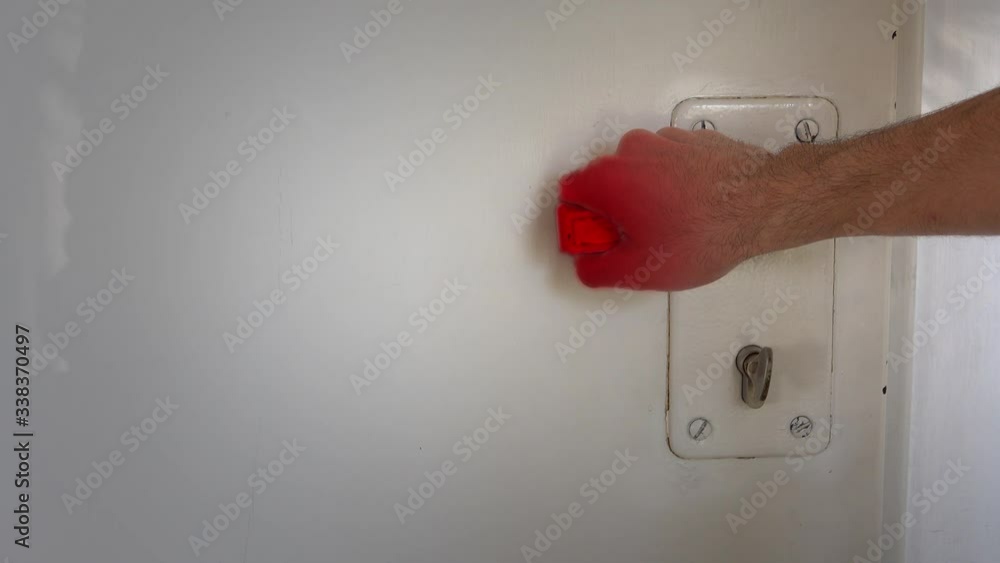 Hand touching Door Handle infected with coronavirus (covid-19) Red ...