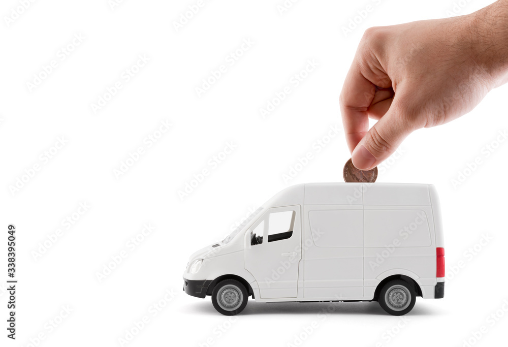 Putting coin into the transport white van car on white background Stock ...