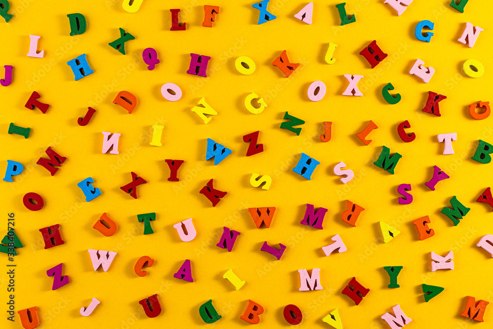 Colorful letters of the English alphabet on a yellow background. Stock ...