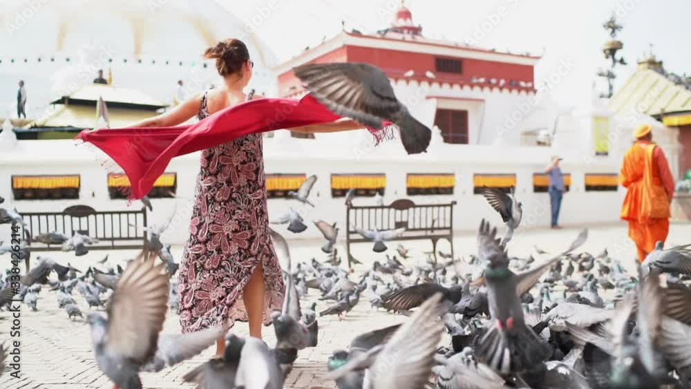 Slow Motion footage of a young laughing female dancing and pirouetting ...