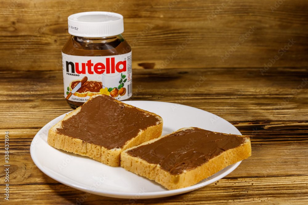 Chocolate hazelnut spread jar Nutella by Italian company Ferrero and ...