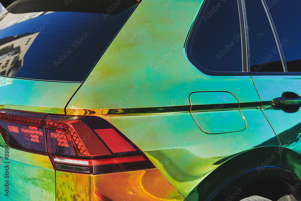 Chameleon holographic colour car. Side view closeup. Beautiful modern ...