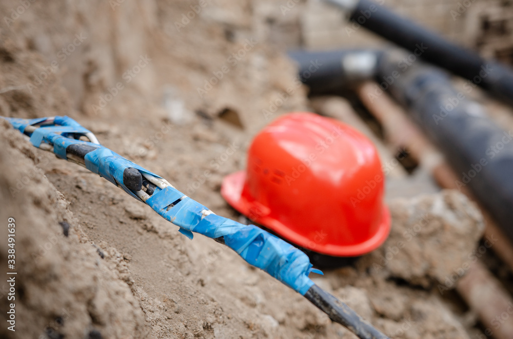 Fotografia do Stock: Connection of an electric cable underground after ...