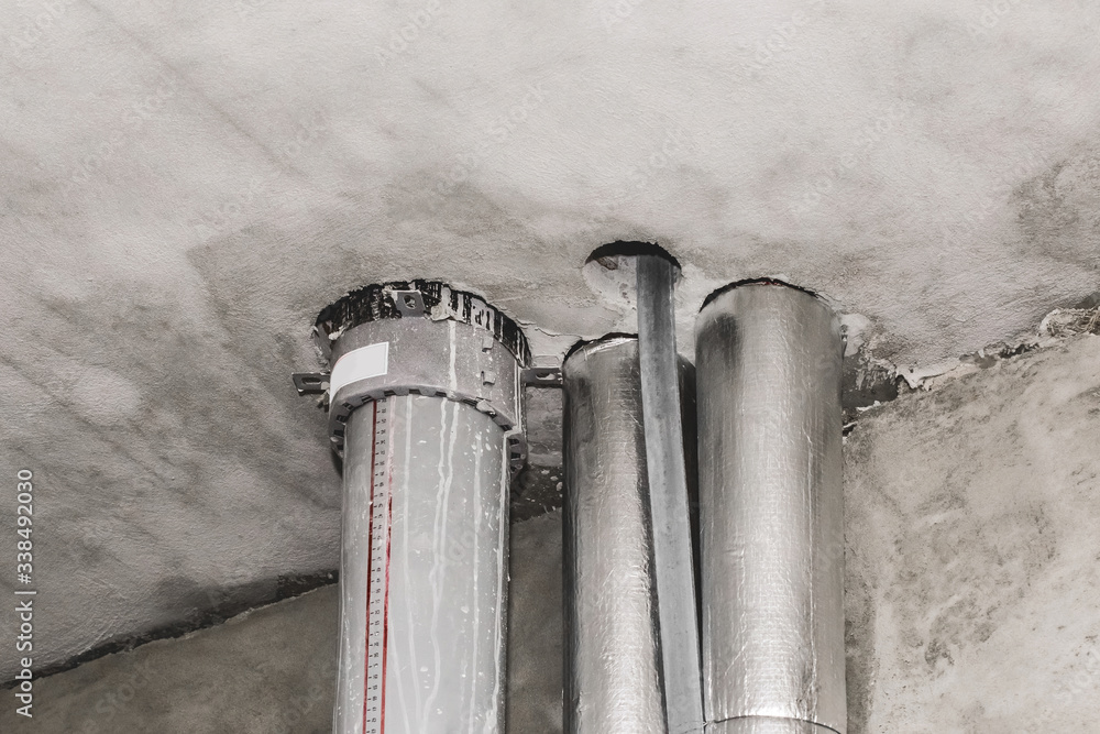 Ceiling fire metal round pipes Insulation system on construction site ...