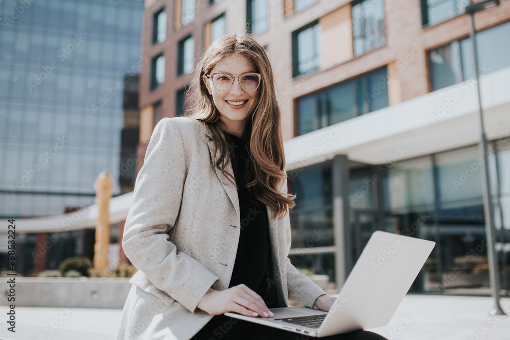 Beautiful lady with laptop working. Female influencer chat with her ...