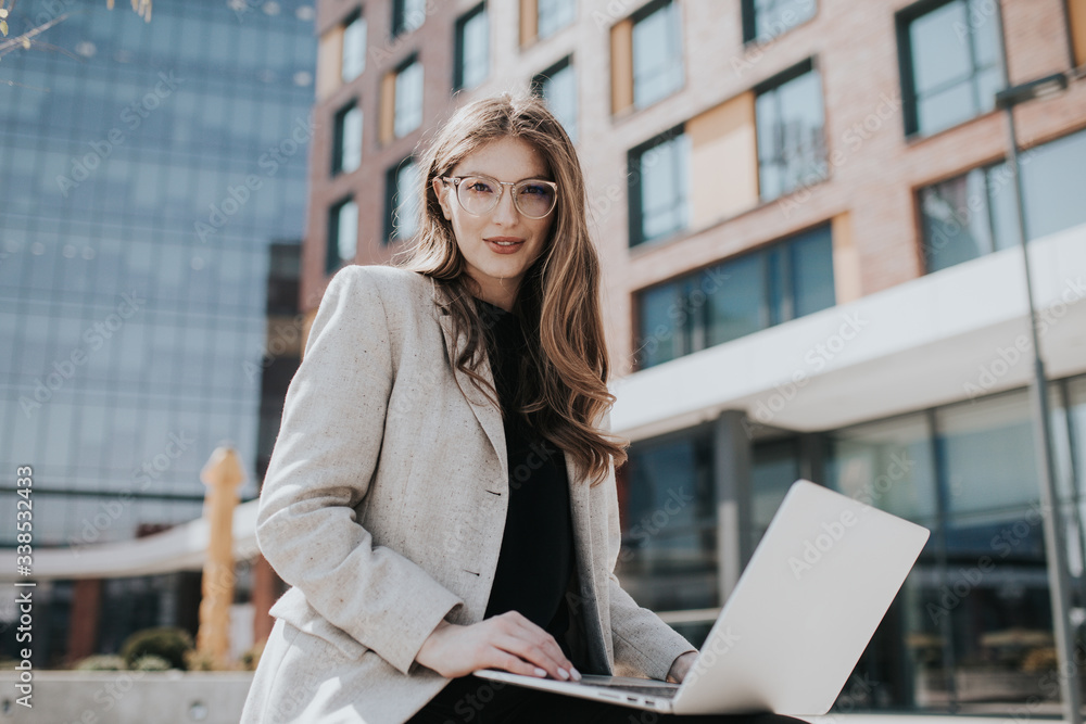 Beautiful lady with laptop working. Female influencer chat with her ...