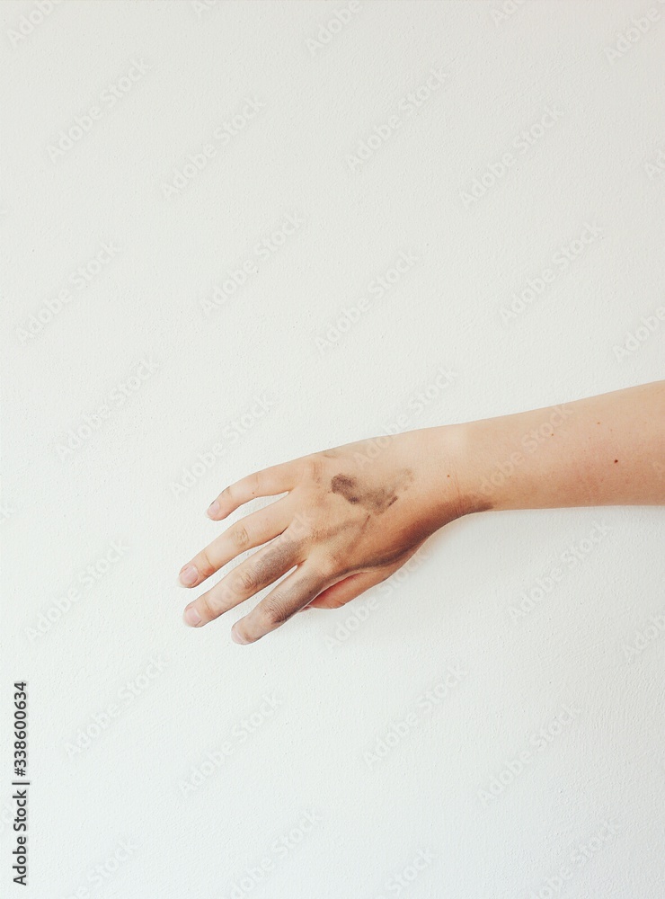 Close-up Of Dirty Hand Over White Background Stock Photo | Adobe Stock