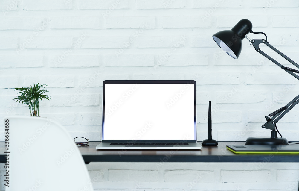 laptop computer white screen on workspace Stock Photo | Adobe Stock