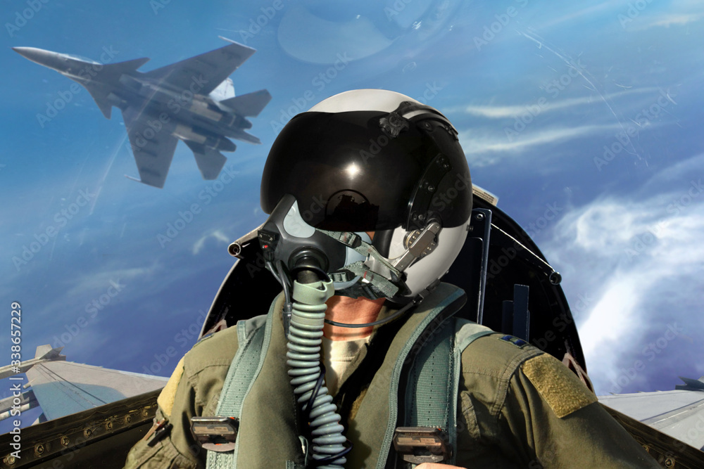 Fighter pilots cockpit view under cloudy blue sky Stock Photo | Adobe Stock