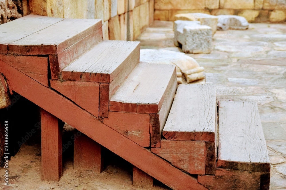 Inside the Qutub Minar Complex with antic ruins and inner square ...